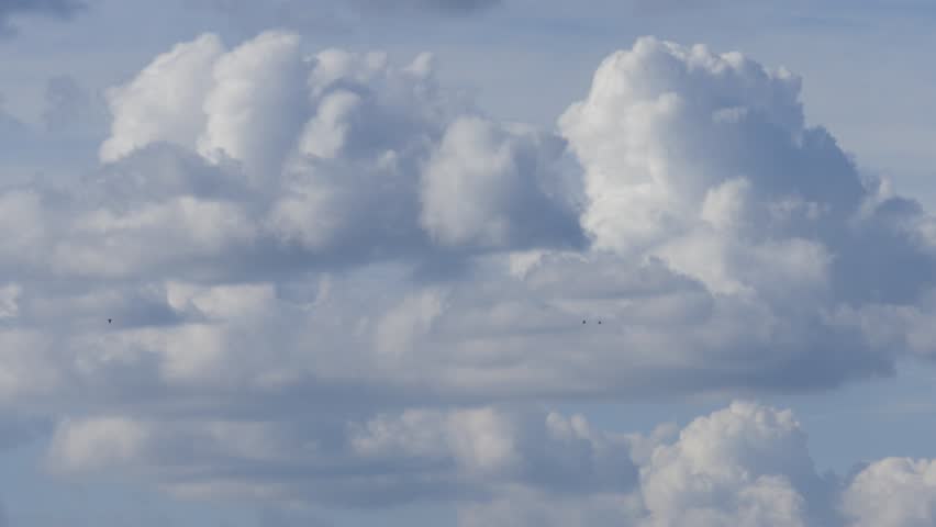 Stock Video Clip of Real Time Big Grey and Fluffy Clouds | Shutterstock