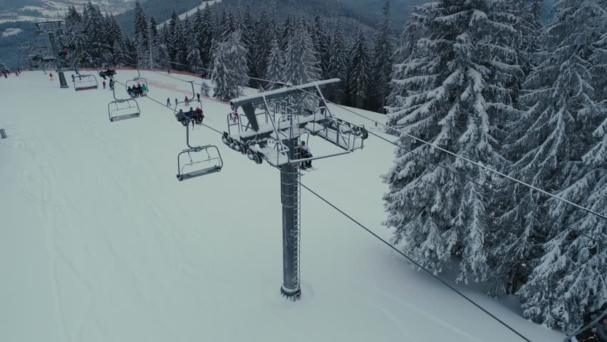 Winter Snowboarding And Ski Drone Flight In Mountains Ski Lift Above ...
