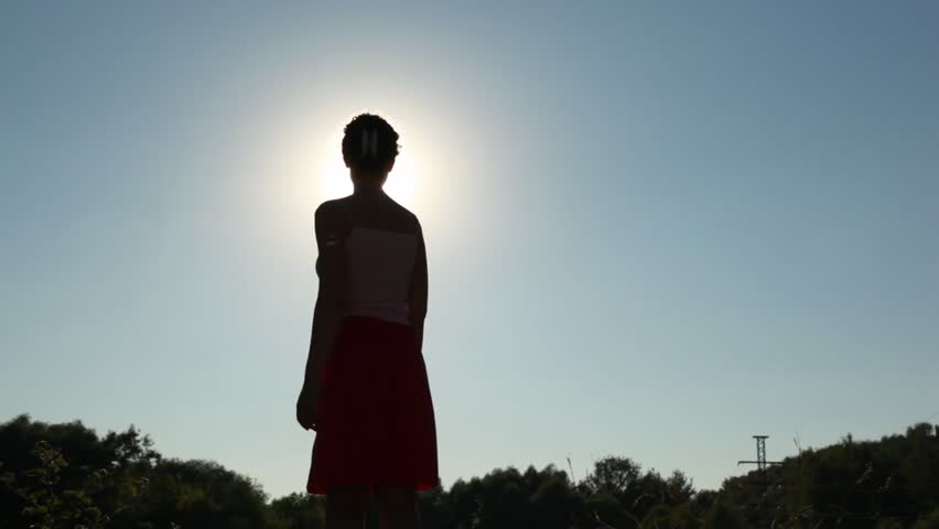 Silhouette of Woman Rotating Against Stock Footage Video (100% Royalty ...