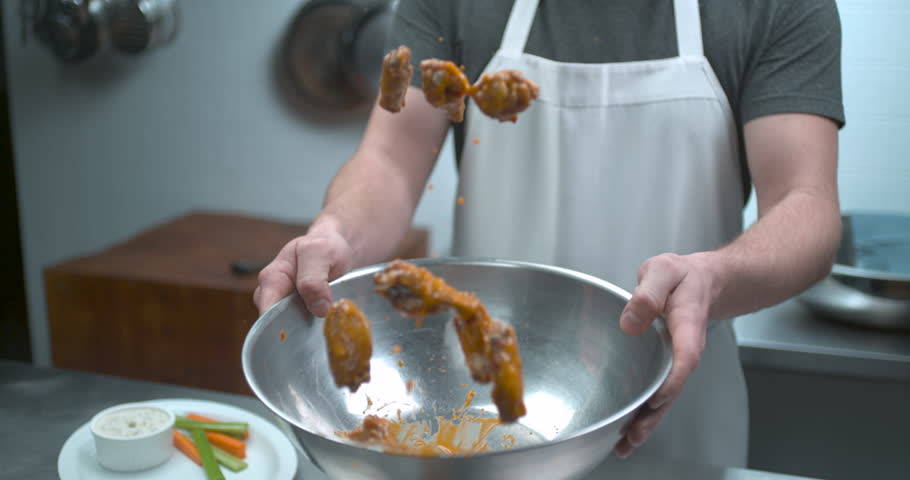 Male Chef Tossing Chicken Wings Stock Footage Video (100% Royalty-free ...