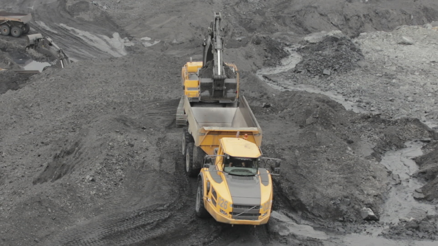 An Excavator Digs Coal and Stock Footage Video (100% Royalty-free ...