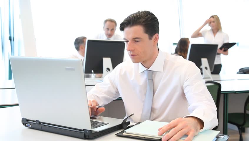 Salesman Working In Office With Laptop Computer Stock Footage Video ...