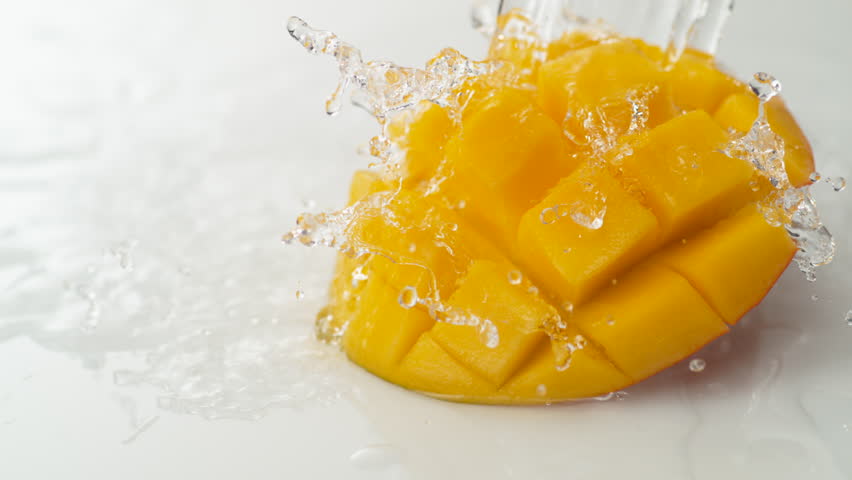 Water Splash and Mango. Shot Stock Footage Video (100% Royalty-free ...