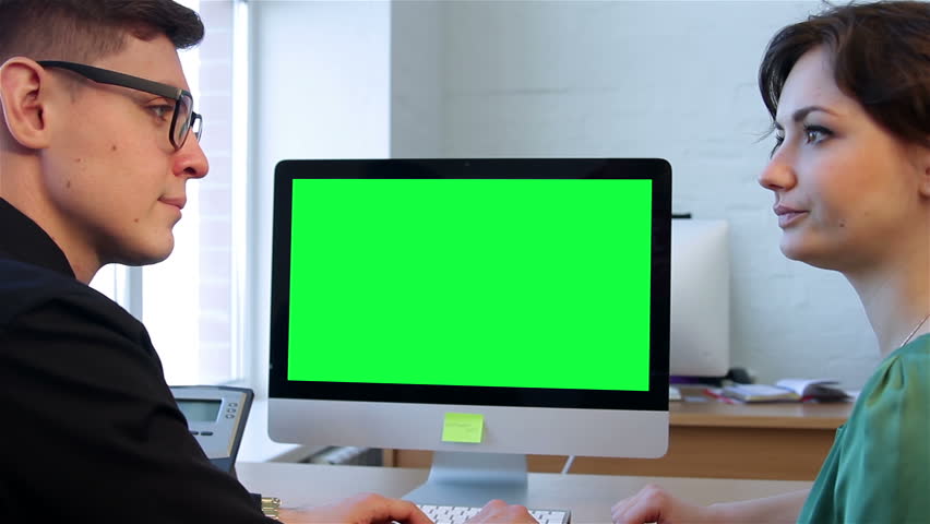 Stock Video Clip of Two businessmen talking and looking at the ...