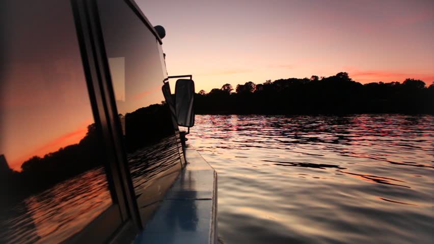 Boat Floating On River Lit Stock Footage Video (100% Royalty-free ...