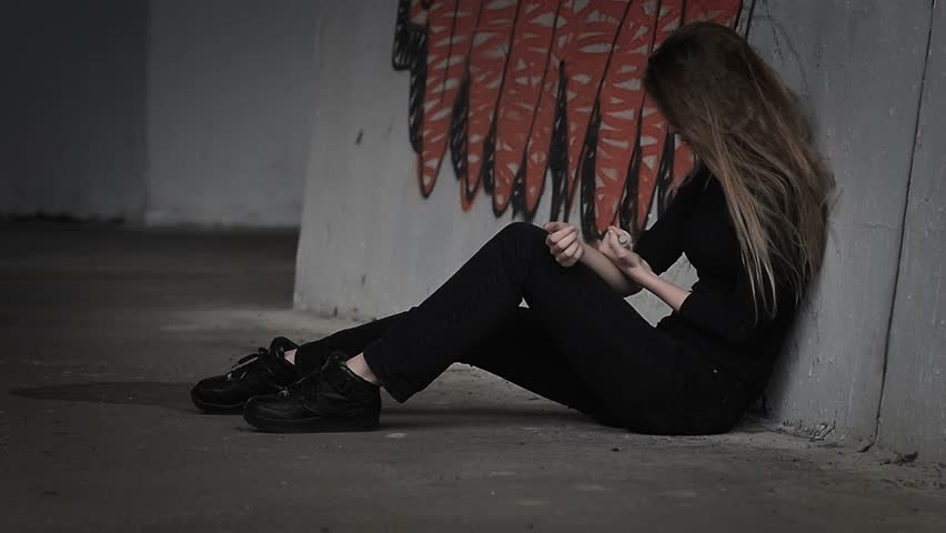 Drug Addict Girl Sitting Alone, Leaning Against Concrete Wall, Then ...