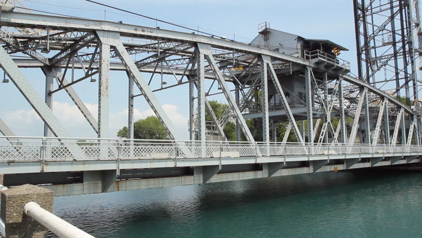 Traffic Moving Across Vertical Lift Bridge On The Welland Canal At ...