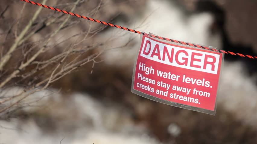 Danger Sign Along Dangerous Flood Water In Stream, Creek And River ...