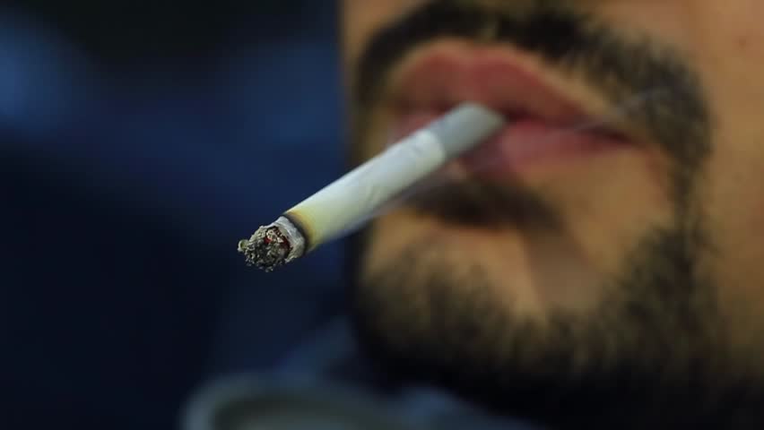 Man Lighting up Cigarette with Stock Footage Video (100% Royalty-free ...