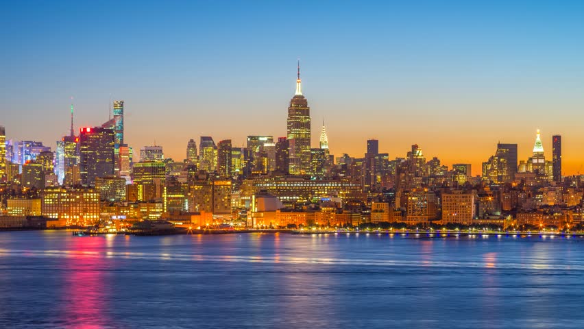 Sunset, Dusk And Night With A Super Moon Rising Above New York Skyline ...