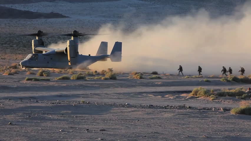 US Marine V-22 Osprey Idles On Runway In Desert Location Stock Footage ...