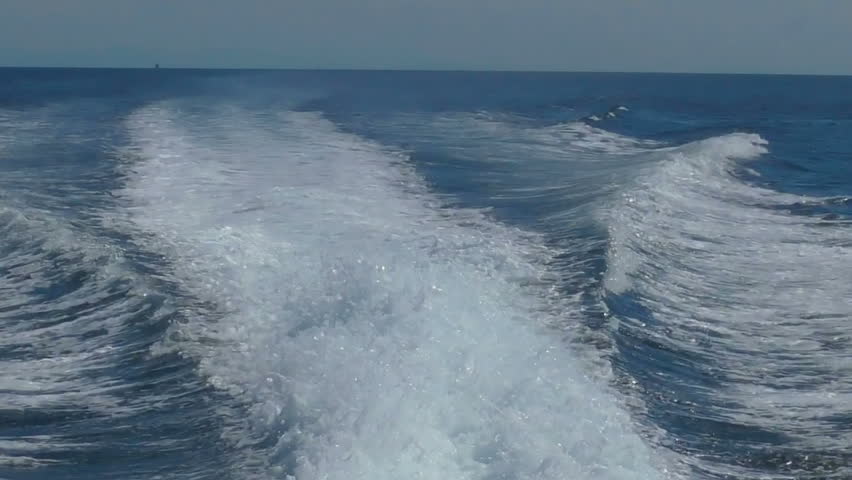 Power Boat Cutting Through The Waves - Slow Motion. Slow Motion Shot Of ...