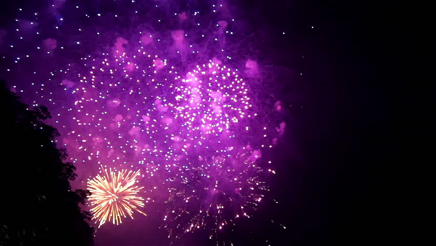 Beautiful Purple Fireworks With Laser Show On Winter Night Sky In Eve ...