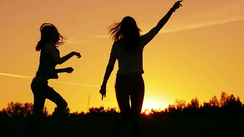 Two Friends, Young Girls Enjoy Nature Running, Jumping, Dancing In ...