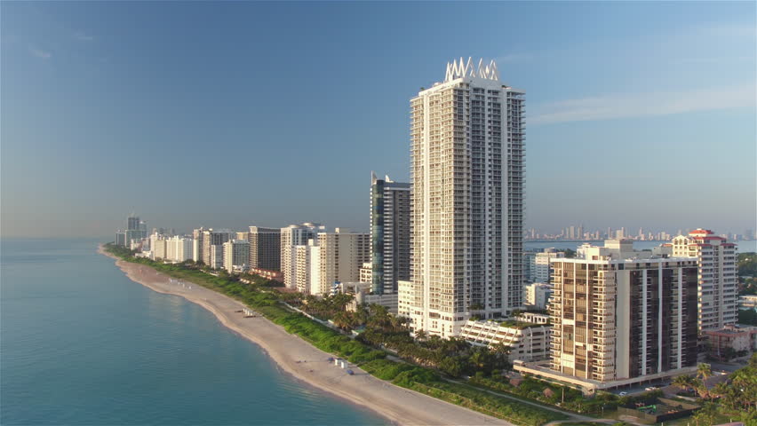 Stock video of aerial: flying along exotic sandy miami | 15296458 ...