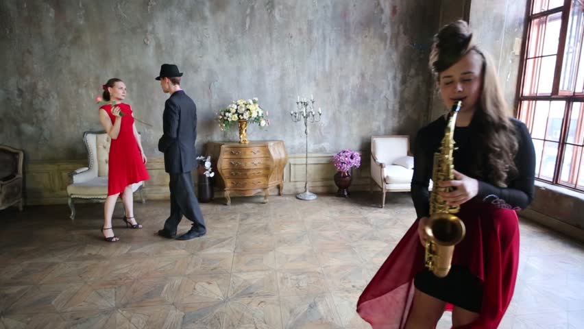 Couple Dancing Tango With Rose In Teeth In Retro Room Stock Footage ...