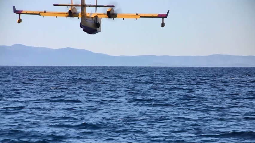 Yellow Fire Fighter Float Plane Stock Footage Video (100% Royalty-free ...