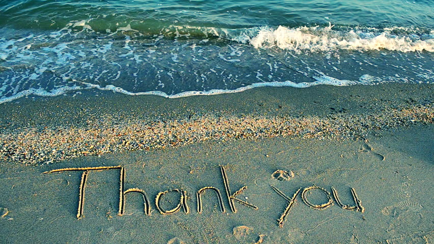 Stock Video Clip of Thank you handwritten in sand on a | Shutterstock