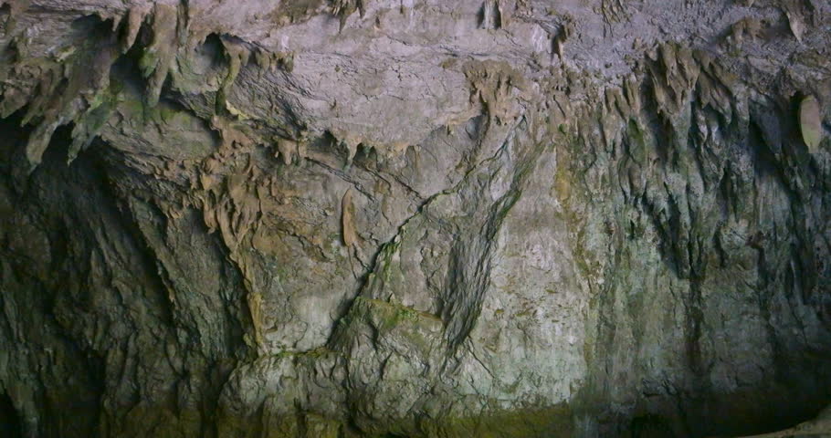 Tilt Up From Bottom Floor To Ceiling Of Rocky Cavern, Darker Cave ...