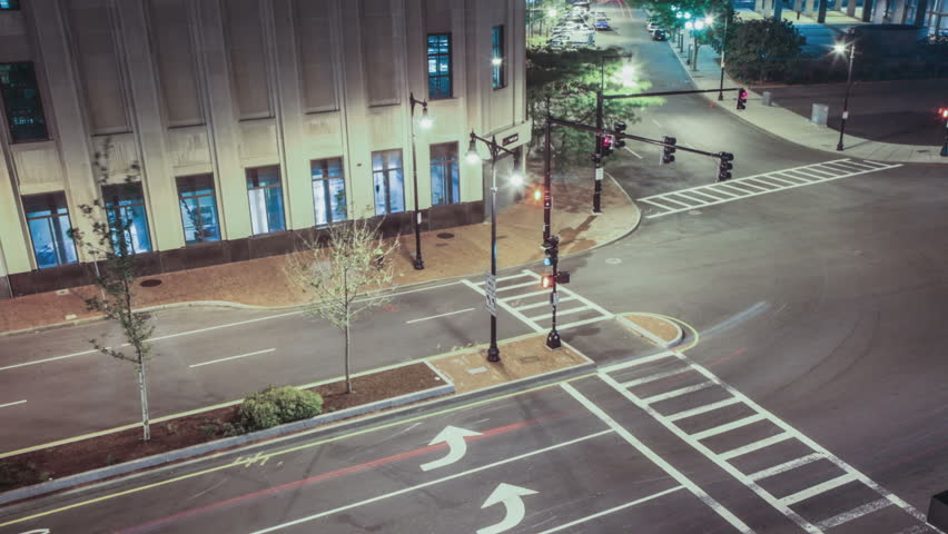 Vertical Top Down Aerial View Of Traffic On Street Intersection At ...