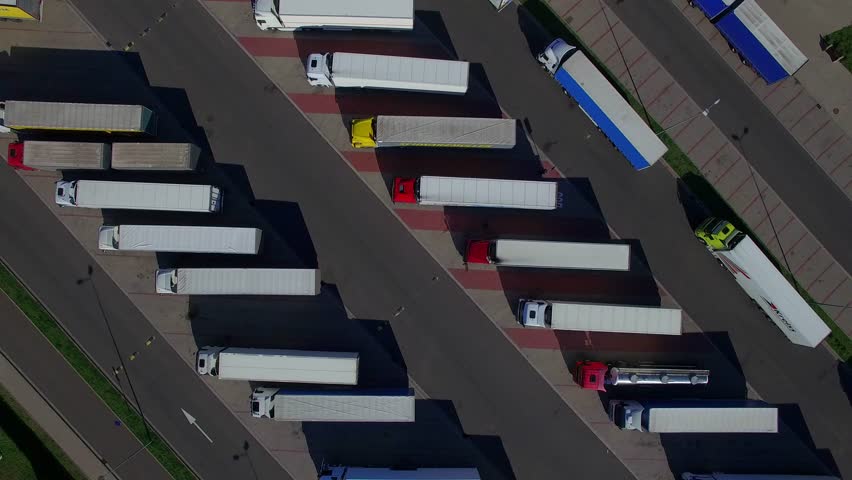 Fly Over Lorry Trucks Rows At Parking Place Spot Lot Aerial Top View ...