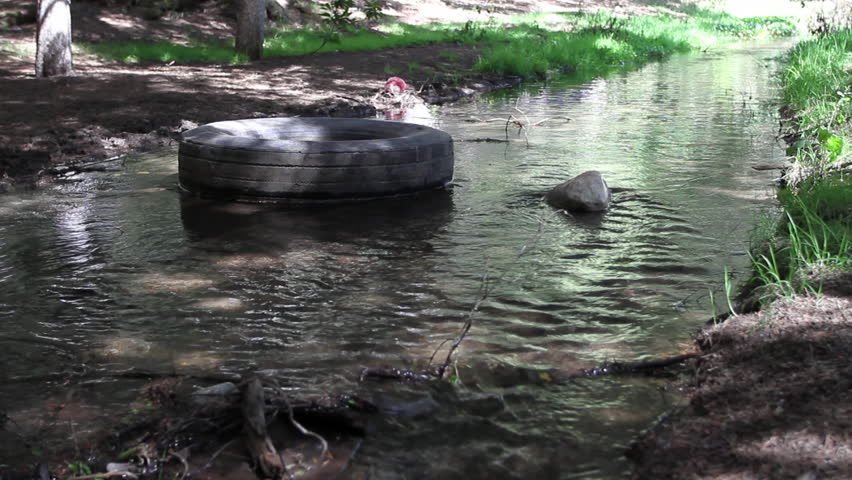 Water Pollution With Garbage, Plastic And Human Waste Waterfall In ...