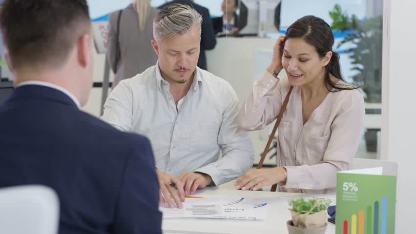 4K Modern City Bank With Customers & Staff, Happy Couple Talking To ...