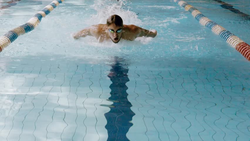 Slow Motion Of Professional Swimmer Swimming The Backstroke Stock ...