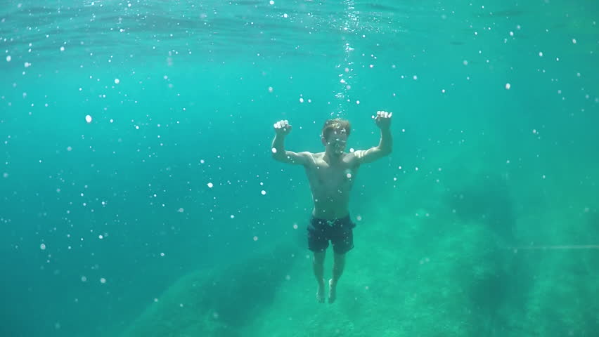 SLOW MOTION, CLOSE UP, UNDERWATER: Young Man Drowning In Deep Ocean ...