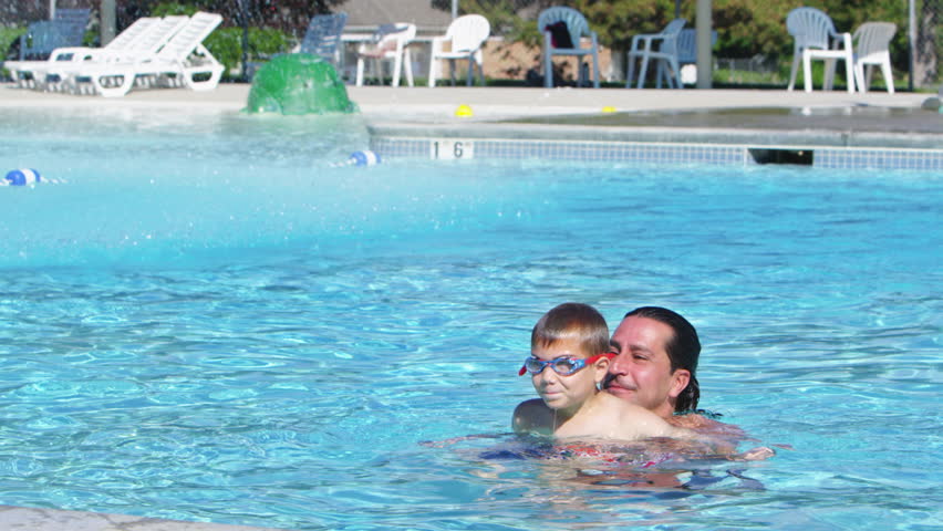 Attractive Young Friends Hanging Out Together In A Pool Outdoors On A ...