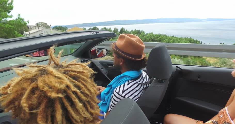 Black Handsome Man With Dreadlocks Driving His Friends In Convertible ...