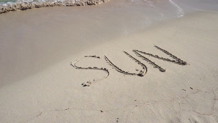 Stock video of sun written in sand beach washed | 25076138 | Shutterstock