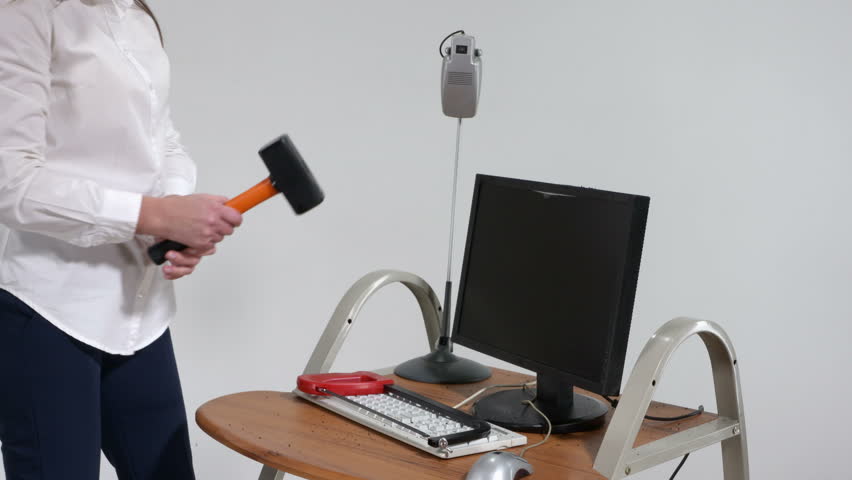Angry Woman Office Worker Destroying Desktop Computer With Sledgehammer ...