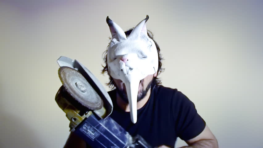 An Evil Man (a Crazy Maniac, A Psycho Killer) Wearing A Scary Bunny ...