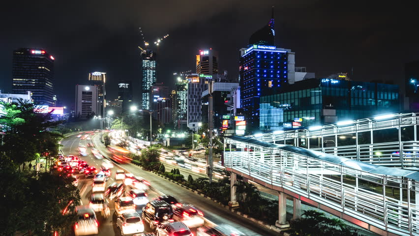 Traffic At Night On A Busy Street In Central Jakarta, Indonesia Capital ...