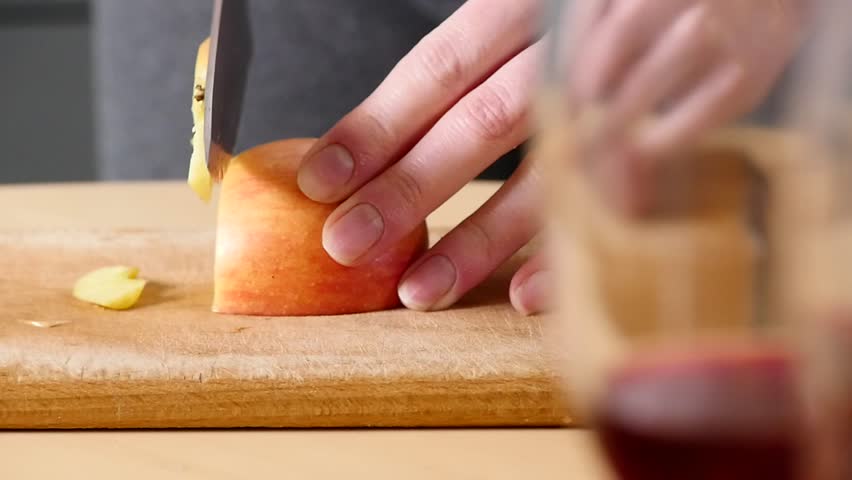 Cutting Apple On Slices. Preparing Ingredients For Baking Apple Pie ...