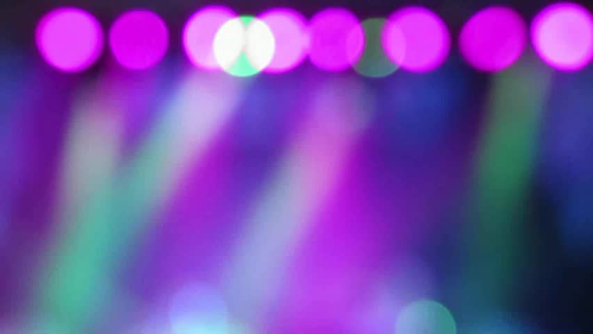 Background. Bright Light Of The Beams Of Multi-colored Spotlights On ...