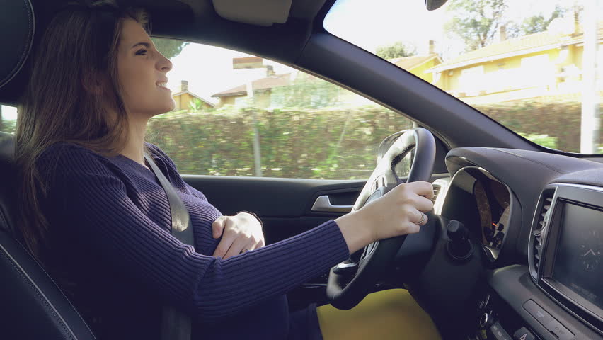 Stunning Female Model Seducing While Driving Car Happy 库存影片视频 5304839
