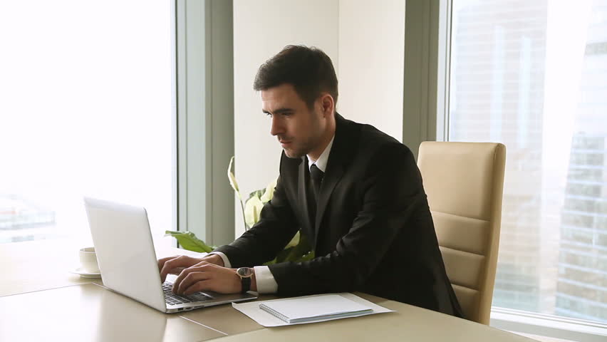 Feet Up On Desk Stock Footage Video | Shutterstock