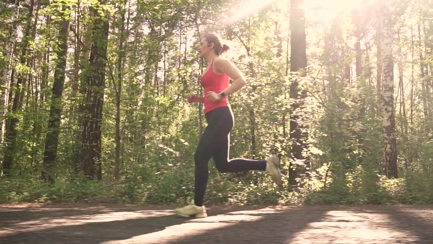 Stock video of attractive girl goes in for sports | 27293818 | Shutterstock