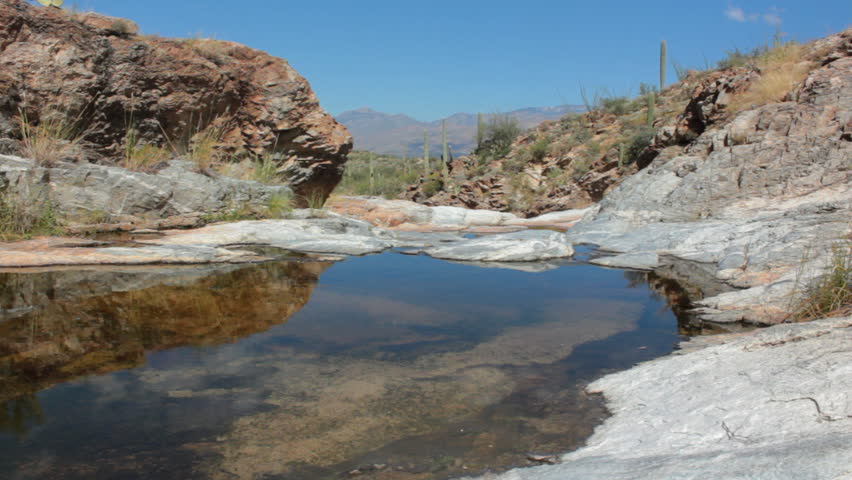 Time Lapse, Clouds Stream Over Arizona Desert Hills Filled With Dozens ...