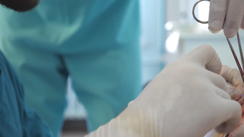 Two Patients Are Visited By Their Medical Teams Who Chat To Them And ...