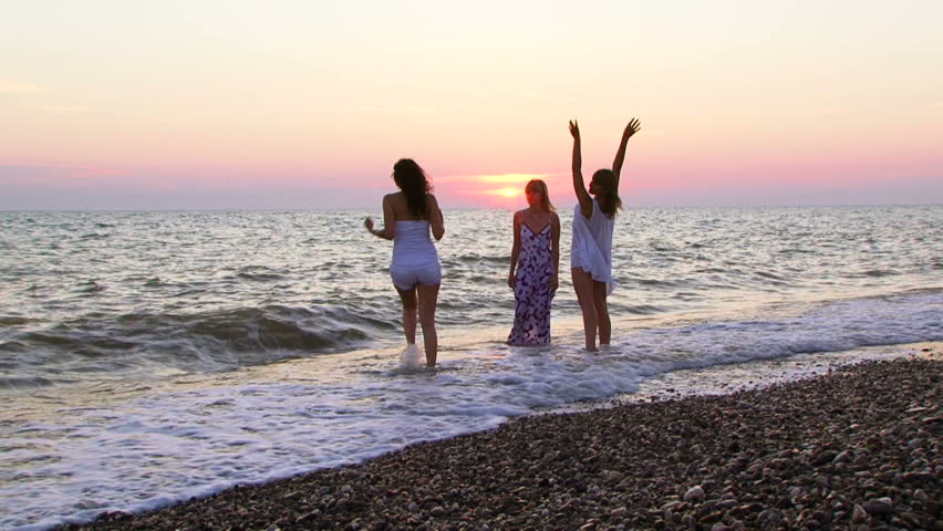 Stock video of friends spending time near the sea | 3499088 | Shutterstock