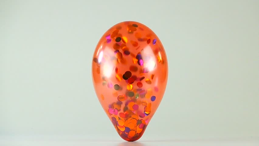 Slow Motion Explosion Of A White Balloon On A White Background Stock ...