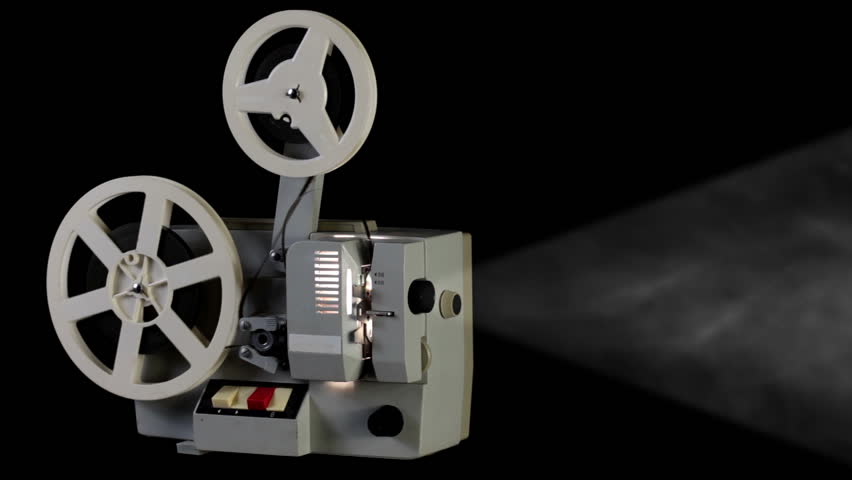 Retro Movie Projector On A Black Background. The Film 8 Millimeters ...