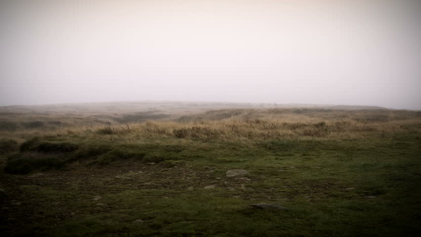 Misty Yorkshire Moor Monument. A Panning Shot Of A Bleak Yorkshire Moor ...