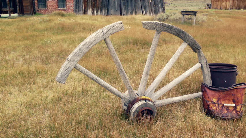 Half Buried Wagon Wheel in Stock Footage Video (100% Royalty-free ...