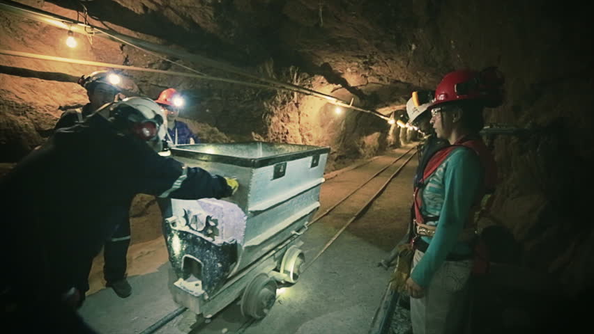 Stock video of workers pushing mining cart on tunnel | 5176568 ...