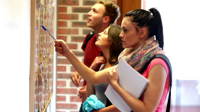 Stock video of students checking the notice board in | 5276138 ...