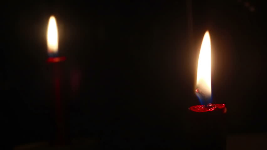 Lit Candle and Reflected in Stock Footage Video (100% Royalty-free ...